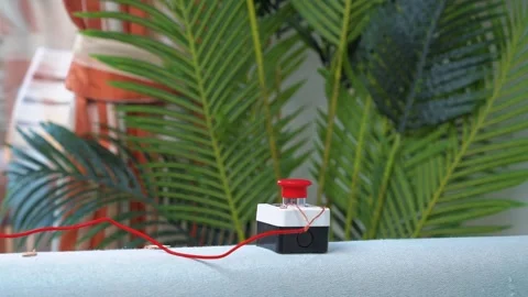 Red button bomb with wires, toy detonato... | Stock Video | Pond5