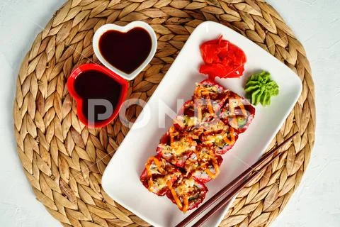 Red California Sushi roll in masago or tobiko caviar. Inside-out ...