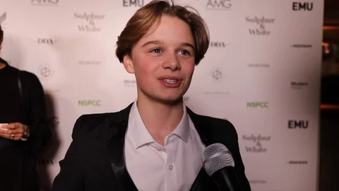 Red carpet interview with Hugo Stone at ... | Stock Video | Pond5