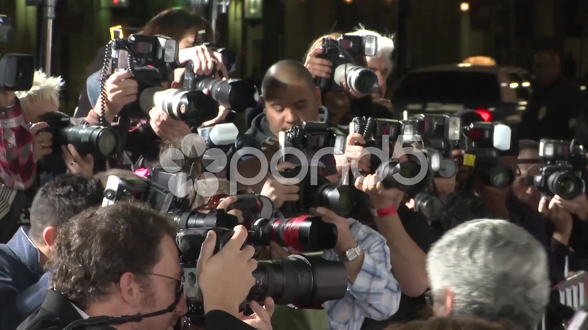 Photographers Taking Pictures At Red Carpet