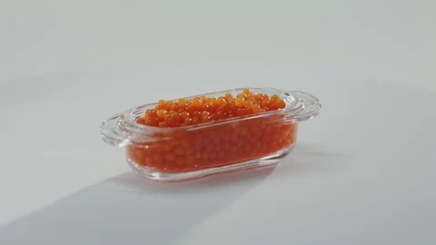 Red Caviar. Glass jar 50 gr rotated back... | Stock Video | Pond5