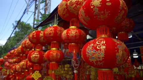 Red Chinese flashlight during the day. | Stock Video | Pond5