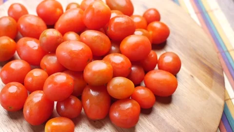 red color cherry tomato on red backgroun... | Stock Video | Pond5