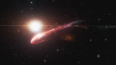 A red comet illuminated by the light fro... | Stock Video | Pond5