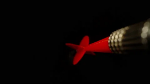 The red dart for darts rotates and flies... | Stock Video | Pond5
