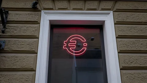 Red EURO logo on a reflective window of ... | Stock Video | Pond5