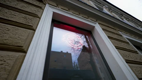 Red EURO logo on a reflective window of ... | Stock Video | Pond5