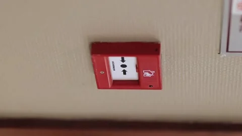 Red fire alarm button. Red fire alarm bu... | Stock Video | Pond5
