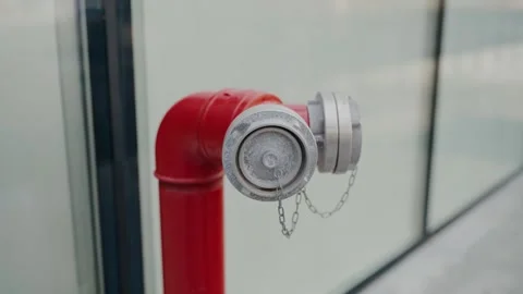 Red fire hydrant pipe stands on street n... | Stock Video | Pond5