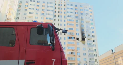 Red fire truck stands against the backgr... | Stock Video | Pond5