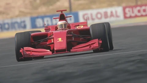 Red formula one race car driving across ... | Stock Video | Pond5