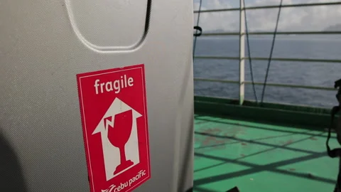 Red Fragile Sticker On A Package Loaded ... | Stock Video | Pond5