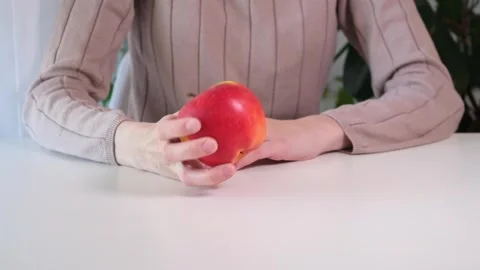 Red fresh apple on the table.Fruit on th... | Stock Video | Pond5
