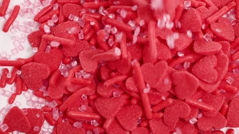 Red Heart Candy Sprinkles Falling in Slo... | Stock Video | Pond5