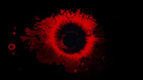 Red Ink drop splatter on black backgroun... | Stock Video | Pond5