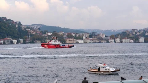 Red Kurtarma 7, fireboat tug sail at Bos... | Stock Video | Pond5