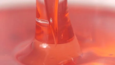 Red Liquid Spill Stock Footage ~ Royalty Free Stock Videos | Pond5