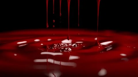Red Liquid Droplets Falling Into Glossy ... | Stock Video | Pond5