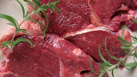 Red meat top view. Cut steak is spinning... | Stock Video | Pond5