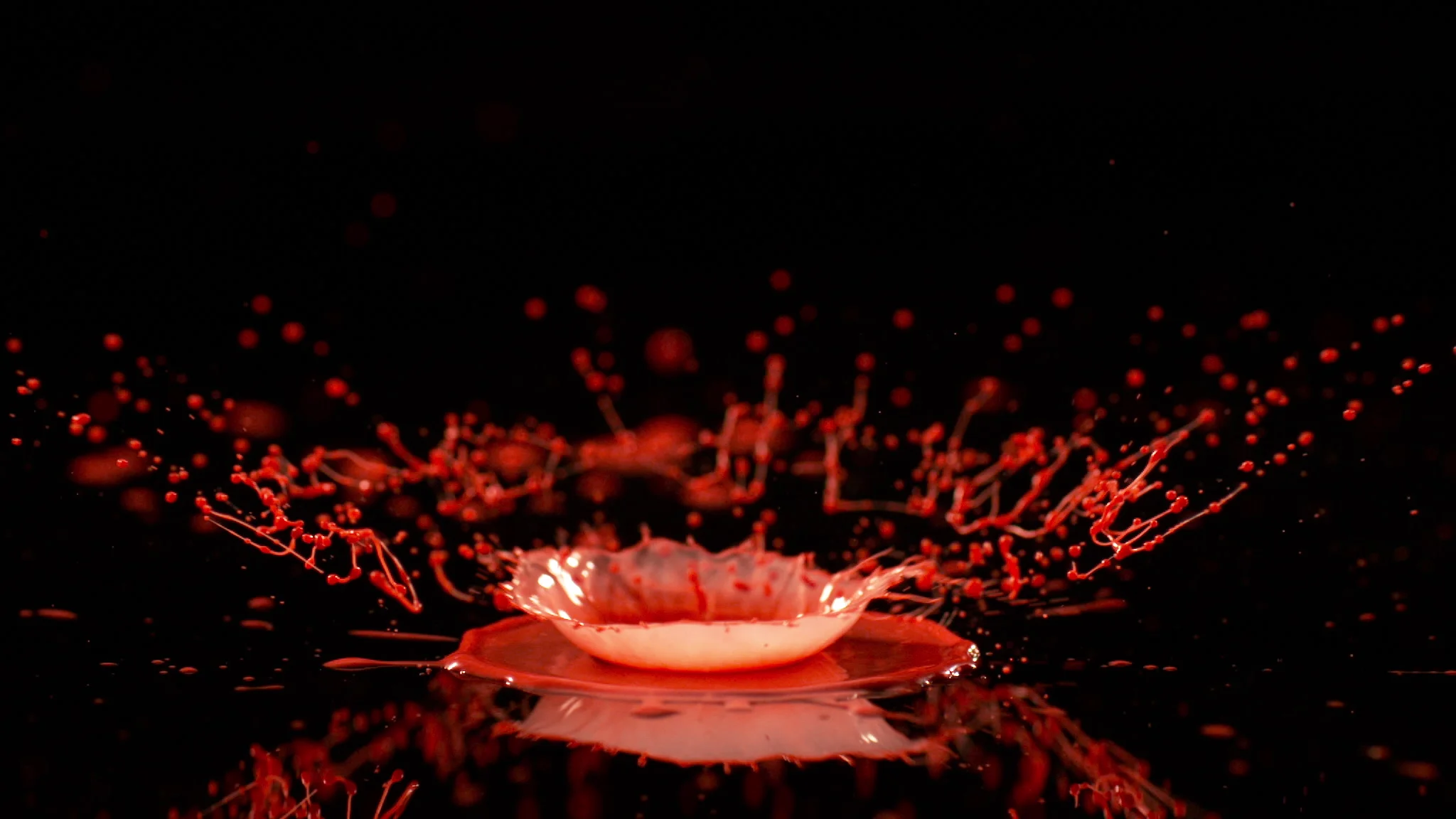 Red Ink In Water On Black