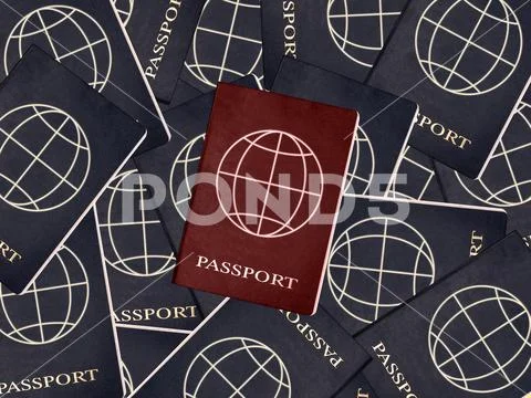 Red passport with blue ones on background. Official documents with ...