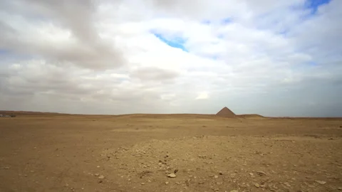 Red pyramid from far away landscape empt... | Stock Video | Pond5