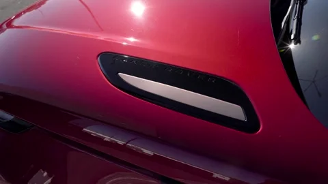 Red Range Rover Velar. Air intake on the... | Stock Video | Pond5