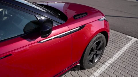 Red Range Rover Velar. Standing in the p... | Stock Video | Pond5