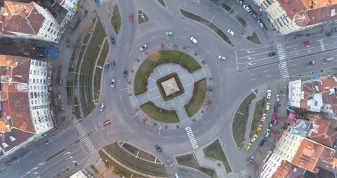 Red roofs of buildings around roundabout... | Stock Video | Pond5