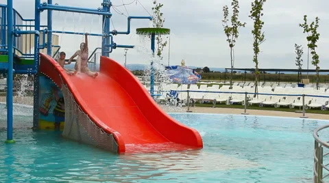 red slide aqua park amusement water park | Stock Video | Pond5