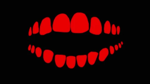 Red teeth on a black background 4K | Stock Video | Pond5