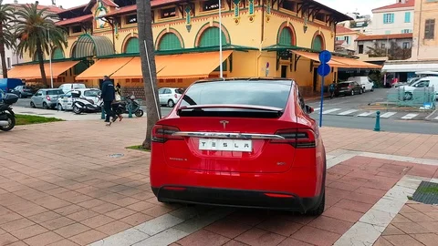 Red Tesla Model X Electric SUV Rear View | Stock Video | Pond5