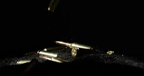 Red-tipped 6mm ARC Bullets Drop Into Bul... | Stock Video | Pond5