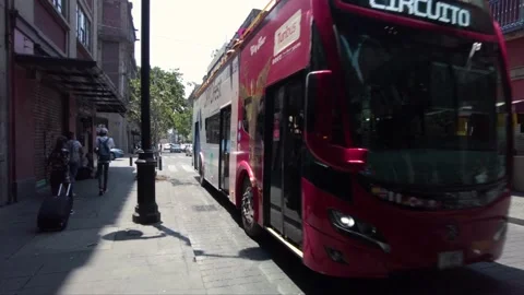 Red Tourist bus named Metrobus driving b... | Stock Video | Pond5