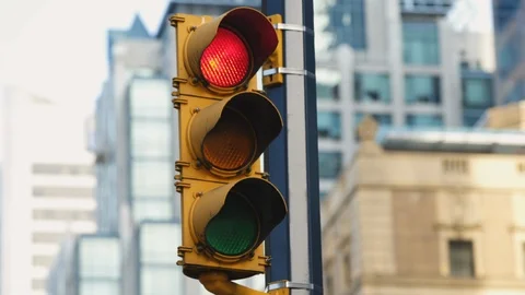 A Red Traffic Light Turning Green with D... | Stock Video | Pond5
