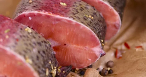 red trout fish on the table, raw fish wi... | Stock Video | Pond5