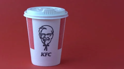 Red white glass of KFC for coffee, cocoa... | Stock Video | Pond5