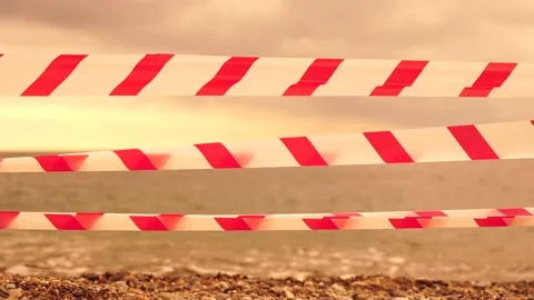 Red white warning tape barrier ribbon sw... | Stock Video | Pond5