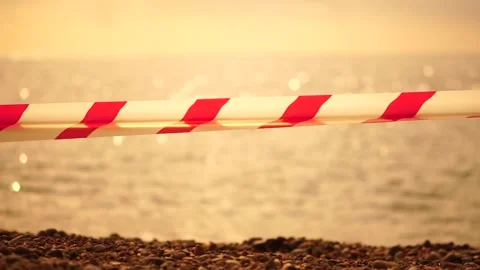 Red white warning tape barrier ribbon sw... | Stock Video | Pond5