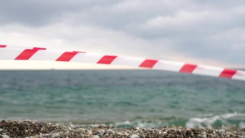 Red white warning tape barrier ribbon sw... | Stock Video | Pond5