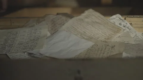 Reenactment | Close up: packing manuscri... | Stock Video | Pond5