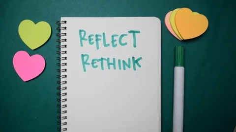 Reflect Rethink Revise write on a book. ... | Stock Video | Pond5