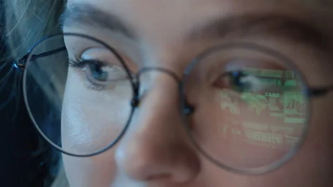 Reflection in Glasses of Computer Screen... | Stock Video | Pond5