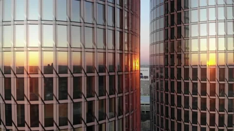 Reflection of golden sunset in glass win... | Stock Video | Pond5