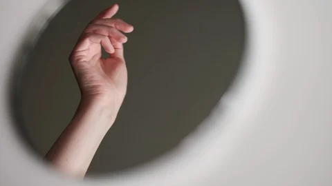 Reflection in the mirror of female hands... | Stock Video | Pond5