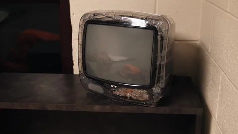 Reflection in prison cell TV screen of p... | Stock Video | Pond5