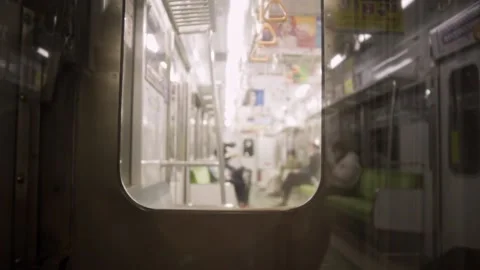 Reflections inside a moving subway train... | Stock Video | Pond5