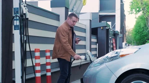 Refueling process of an electric car. | Stock Video | Pond5