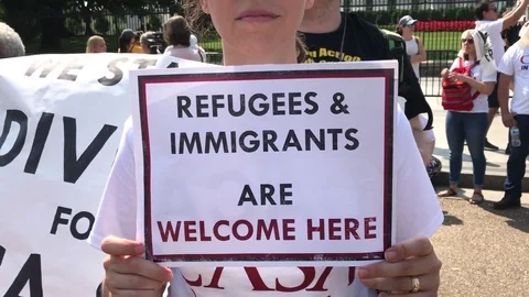 "Refugees and Immigrants Are Welcome Her... | Stock Video | Pond5