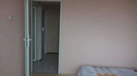 Relaxed boy walking inside his house, be... | Stock Video | Pond5